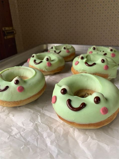 Delicious Mini Donuts With Green Frosting And Pink Sprinkles