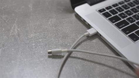 Hand Connecting Usb Hard Drive To Laptop Modern Personal Computer Technology Stock Photo