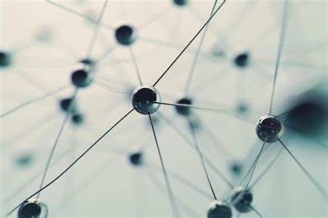 Closeup Of Interconnected Metallic Spheres And Wires Forming A Network Symbolizing Connectivity