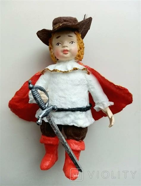 Ялинкова іграшка із вати Дитинка в костюмі Кота у чоботях Висота 10 см 1шт 114961155