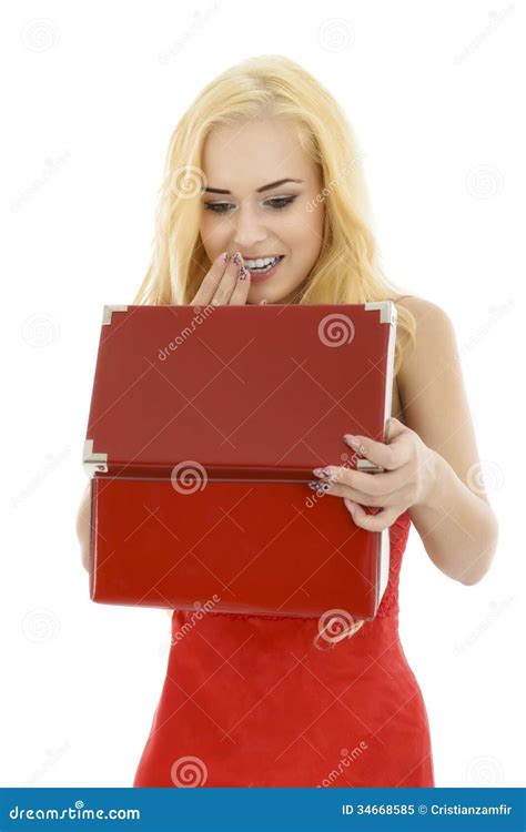 Cute And Blonde Girl In Red Lingerie Looking A Little T Stock Image