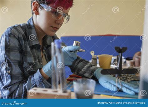 Geek Teenage Girl Engineering An Airplane Model At Home Generation Z Lifestyle Nerd Subculture