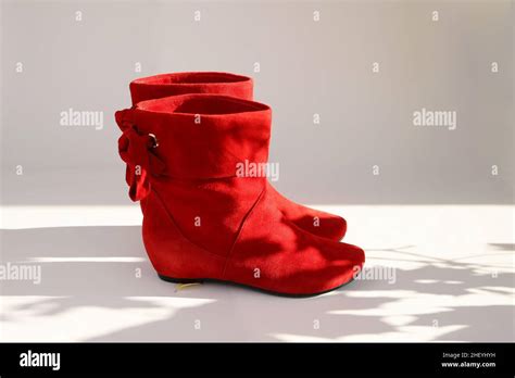 Womens Red Suede Short Angle Boots Without Heels On White Background