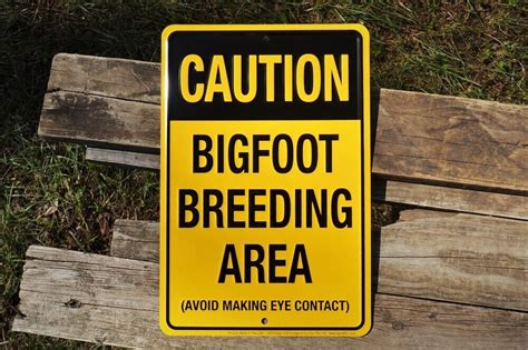 Caution Bigfoot Breeding Area Embossed Tin Sign Finding Warning