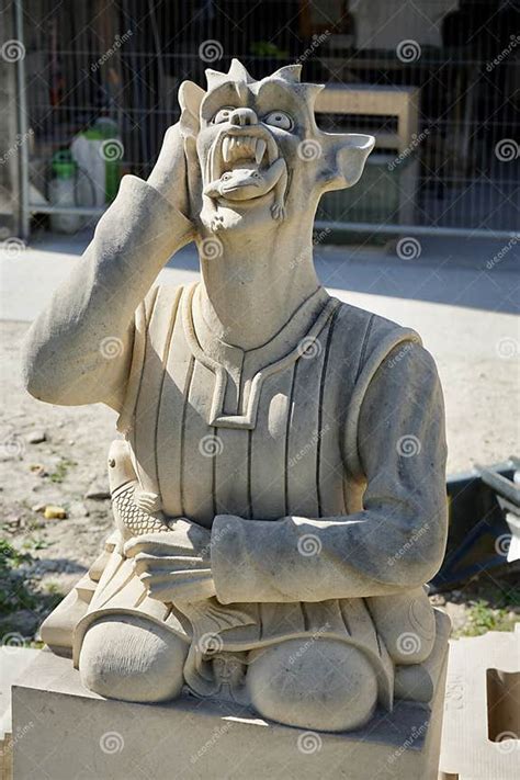 New Carved Stone Gargoyle Figure At York Minster Cathedral With Frog
