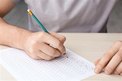 Premium Photo Male Student Passing Exam Closeup