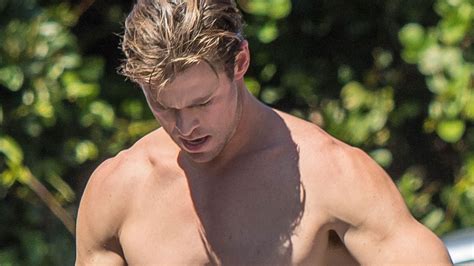 Exclusive Chris Hemsworth Risks Swimming With Sharks But Looks Super
