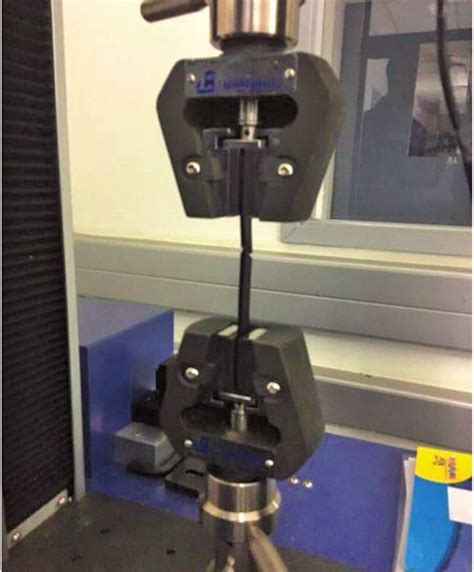 Experimental Setup For Performing Tensile Test Download Scientific