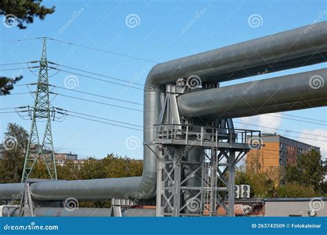 Pipeline And Power Lines In The Photo Pipelines And Power Line Support On The Background Of The