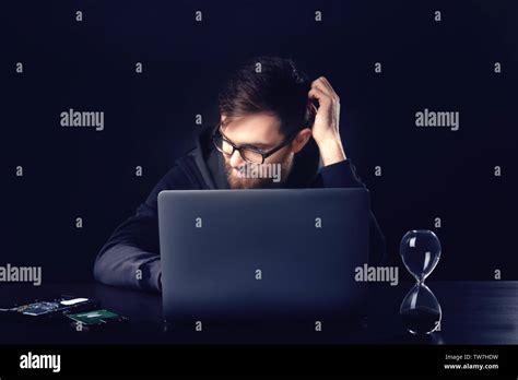 Man Hacking Server Against Dark Background Stock Photo Alamy