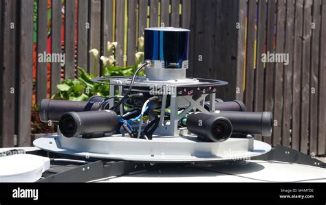 Close Up Of Lidar And Other Sensor Hardware Mounted On Top Of An Experimental Self Driving Car