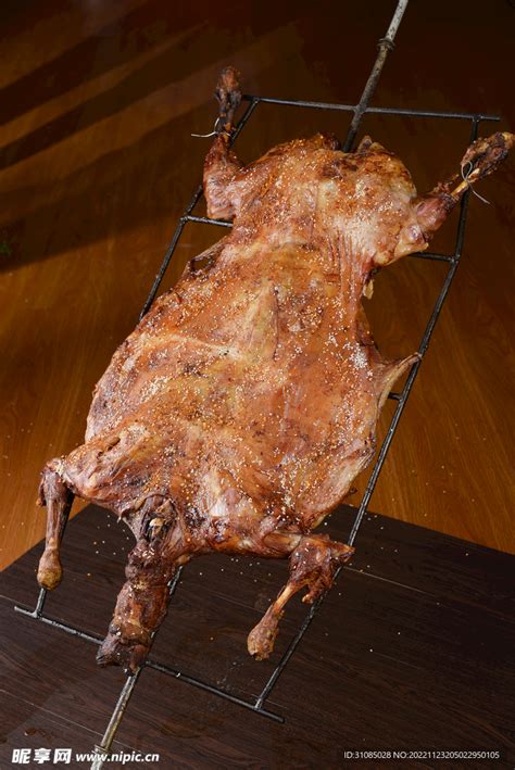 烤全羊 摄影图 传统美食 餐饮美食 摄影图库 昵图网