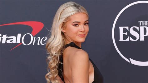 Olivia Dunne Switches Up Her Look In Gorgeous Shiny Blue Leotard And Competition Glam