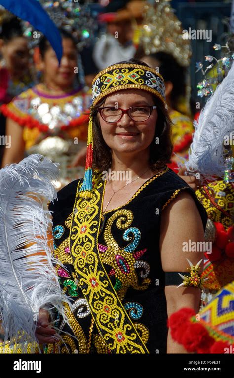 Dayak Woman In Traditional Costume And Spectacles Smiling Gawai