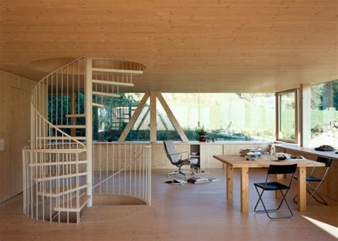 Swiss House By Pascal Flammer With Wooden Braces And A Circular Window