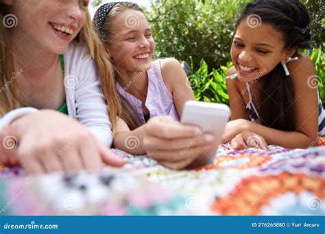 Once Upon A Gigglea Group Of Young Girls Chatting While Relaxing