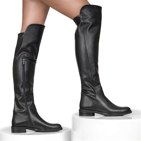 Black Leather Knee High Top Boots With A Flat Heels And Fitted Upper