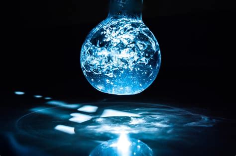 Premium Photo Close Up Of Water In Flask Over Table