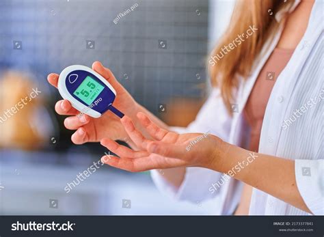 Female Using Glucose Meter Measuring Monitoring Stock Photo 2173377841 Shutterstock