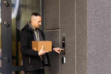 Happy Man Ringing Intercom With Camera In Entryway Stock Image Image Of Technology Male
