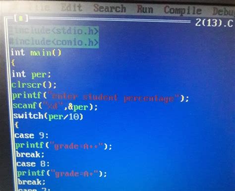 c program to calculate grades of a student using switch statement