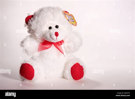 White Teddy Bear With Read Feet Stock Photo Alamy