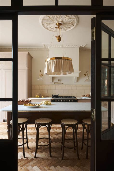 A Pink Devol Shaker Kitchen With A Glazed Pantry In An Edwardian House