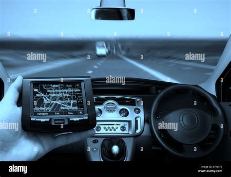 GPS Vehicle Navigation System In A Man Hand Stock Photo Alamy