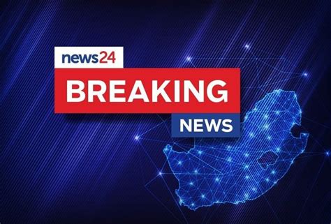 The Breaking News Logo On A Dark Blue Background With Lines And Dots In