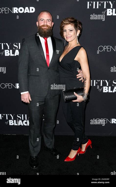 Michael Tiddes Left And Kelly Tiddes Attend The La Premiere Of 50