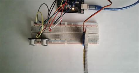 Slash Bit Automatic Railway Crossing Barrier Using Arduino