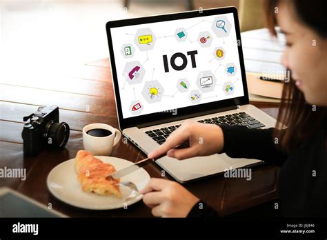 IOT Business Man Hand Working And Internet Of Things IoT Word Diagram As Concept Stock Photo