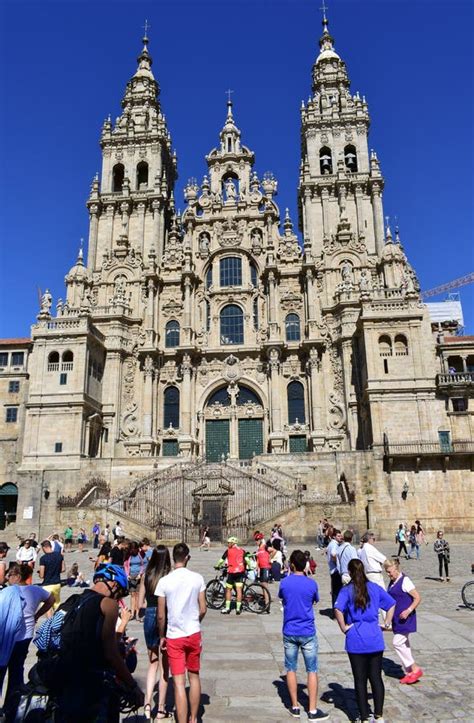 Cathedral With Pilgrims Taking Pictures At Final Stage Of Camino De