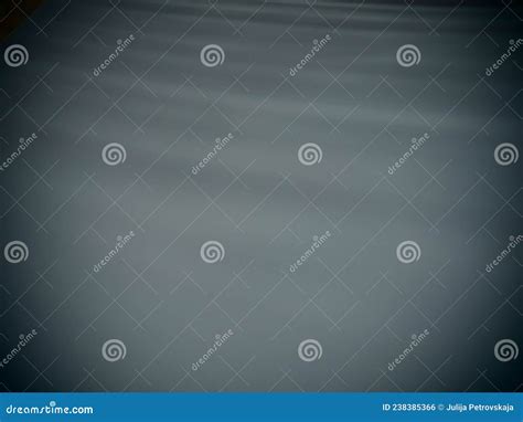 Diagonal Rays Of Light On A Gray Background Blurred Abstract