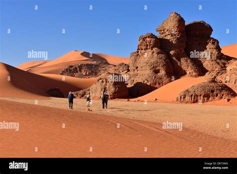 Algeria Sahara Tassili Najjer National Park Tadrart People Hiking