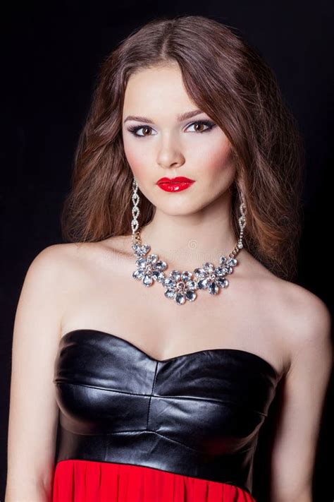 Portrait Of A Beautiful Elegant Girl In Evening Dress With A Large
