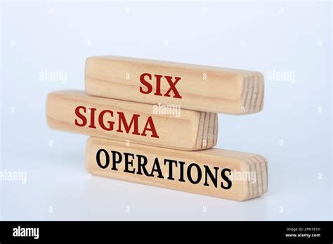 Six Sigma Operations Text On Wooden Blocks Business Culture And