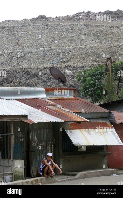 Huts On The Edge Of The Mountains Of Garbage Payatas Garbage Landfill