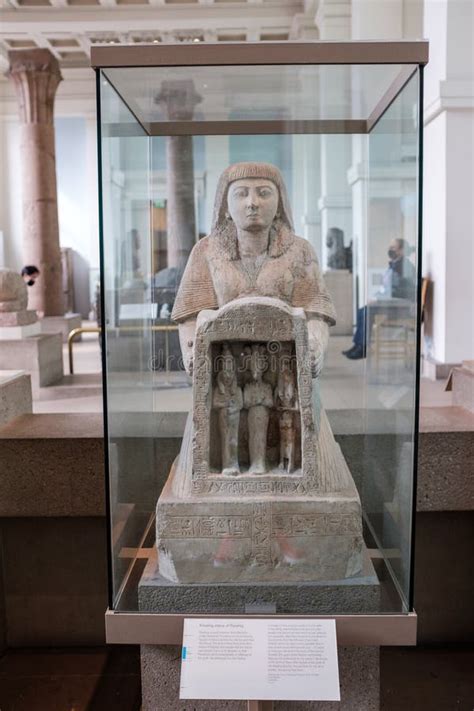Seated Egyptian Statue Displayed In A Glass Case British Museum Uk
