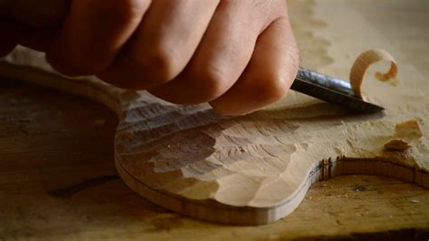 Luthier Manufacturing A Instrument With A Chisel 33982661 Stock Video