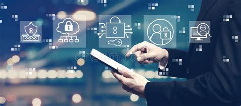 Data Security Concept With Businessman Using A Tablet Stock Image