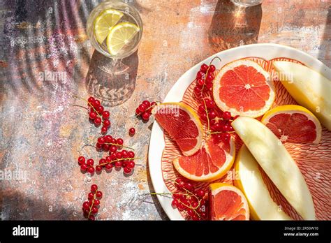 Apricot Red Currents Red Grapfruit And Almond With Glasses Of