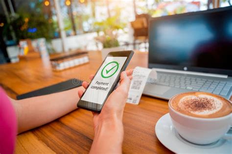 Woman Using Contactless Payment By Mobile Phone With QR Code At Cafe Stock Photo Image Of