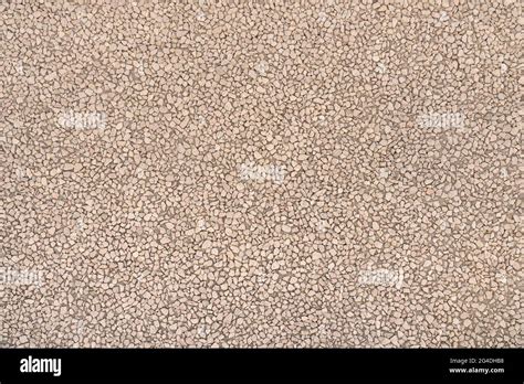 Exposed Aggregate Concrete Made Of Small Angular Stones In Close Up