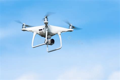 Uncrewed Aerial Vehicle Uav Drone Quad Copter Or Quadrocopter Dji With Digital Camera Flight In