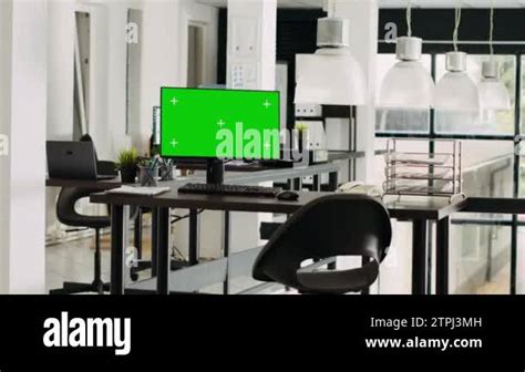 Greenscreen Monitor In Coworking Space Running On Desk Open Floor Plan Small Business Office