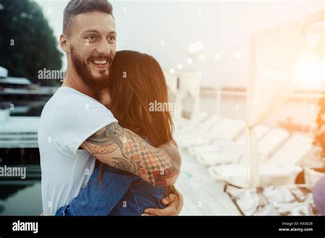 Guy Hugging His Woman Stock Photo Alamy