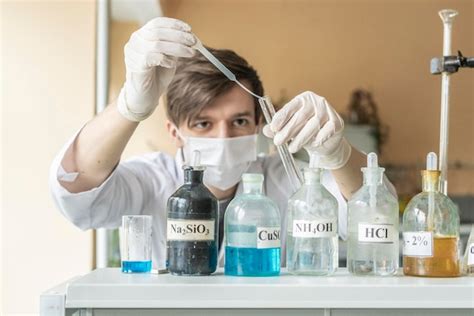 Premium Photo Science Worker Conduct Experiments With Chemical Liquid B