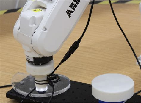 sensor mounted as an end effector on the robot arm used for