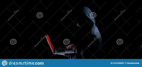 Hacker Attack Cyber Security Digital Laptop In Hacker Man Hand Isolated On Black Blurred